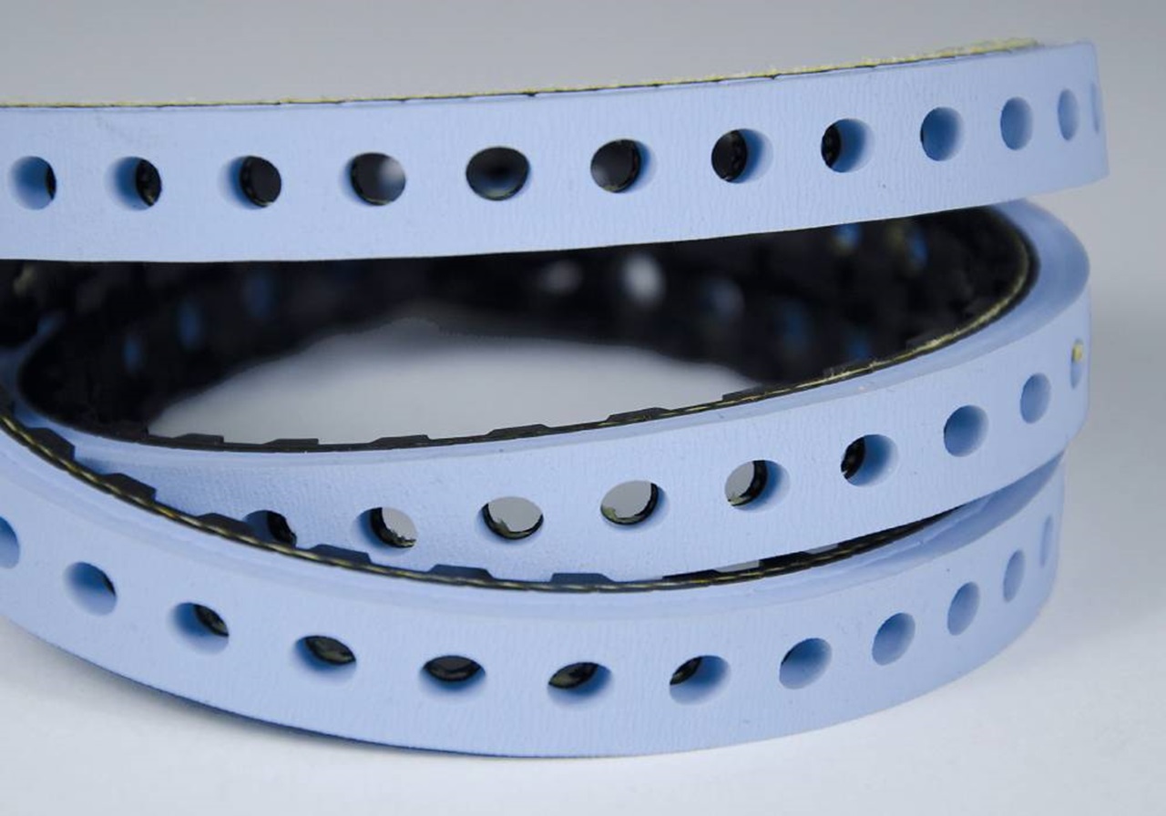 Fabric-based conveyor and processing belts
